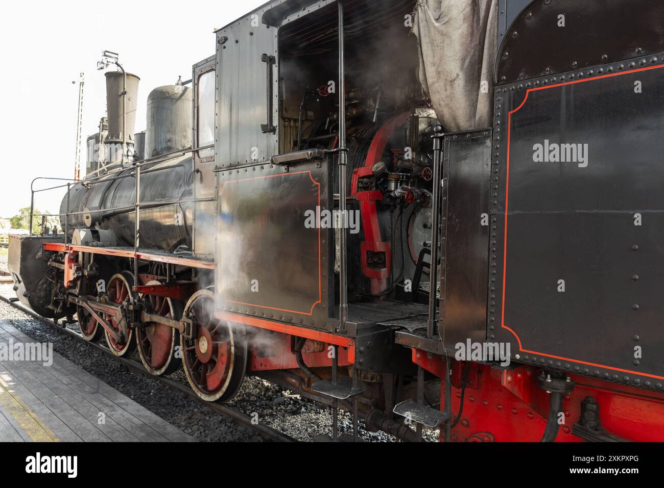 Vintage black steam locomotive with red details is on Sortavala Central ...