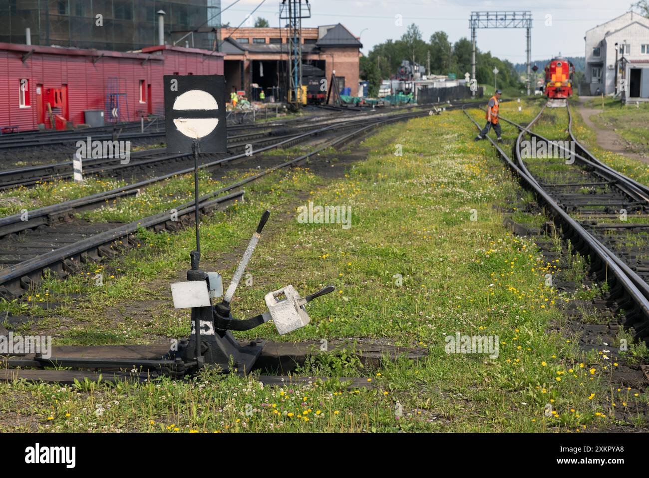 An old manual powered railroad switch with black and white details ...