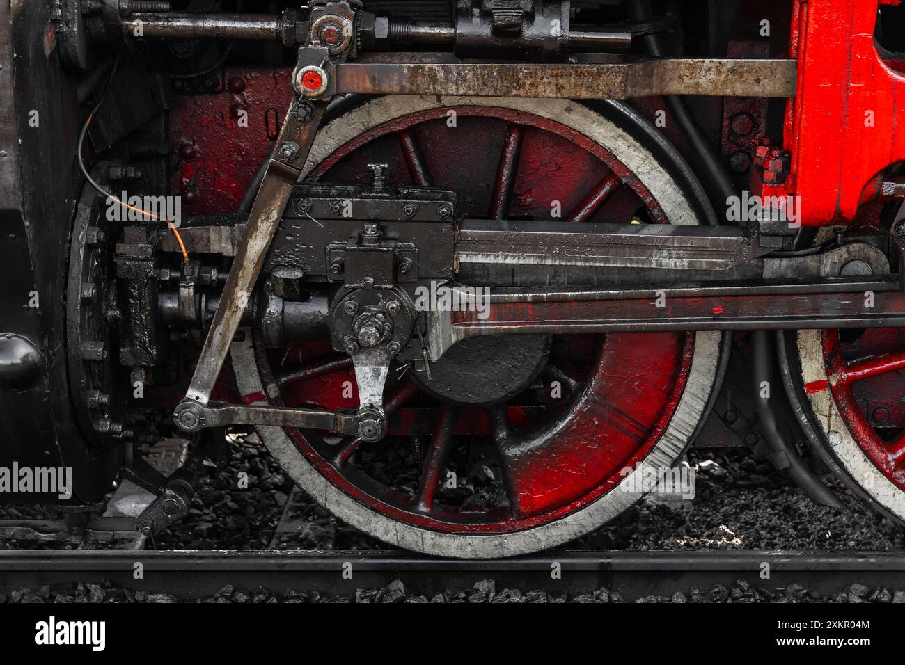 Wheel and power details of vintage steam locomotive, close-up photo ...