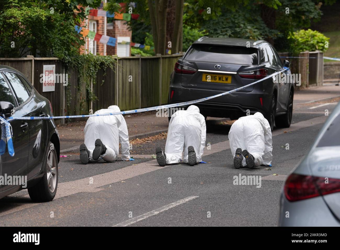 Forensic officers search near the scene at Sally Port in Gillingham ...