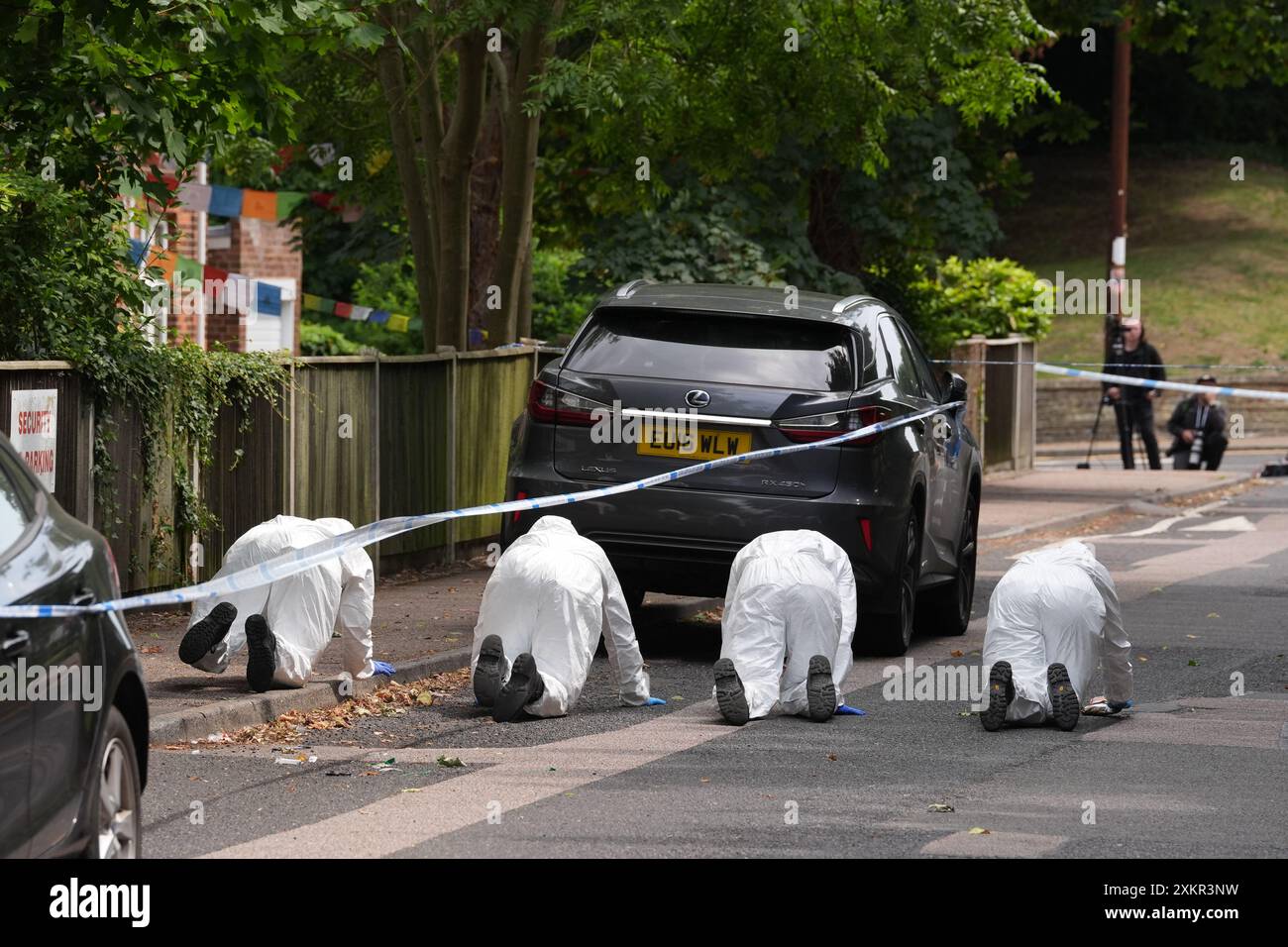 Forensic officers search near the scene at Sally Port in Gillingham ...