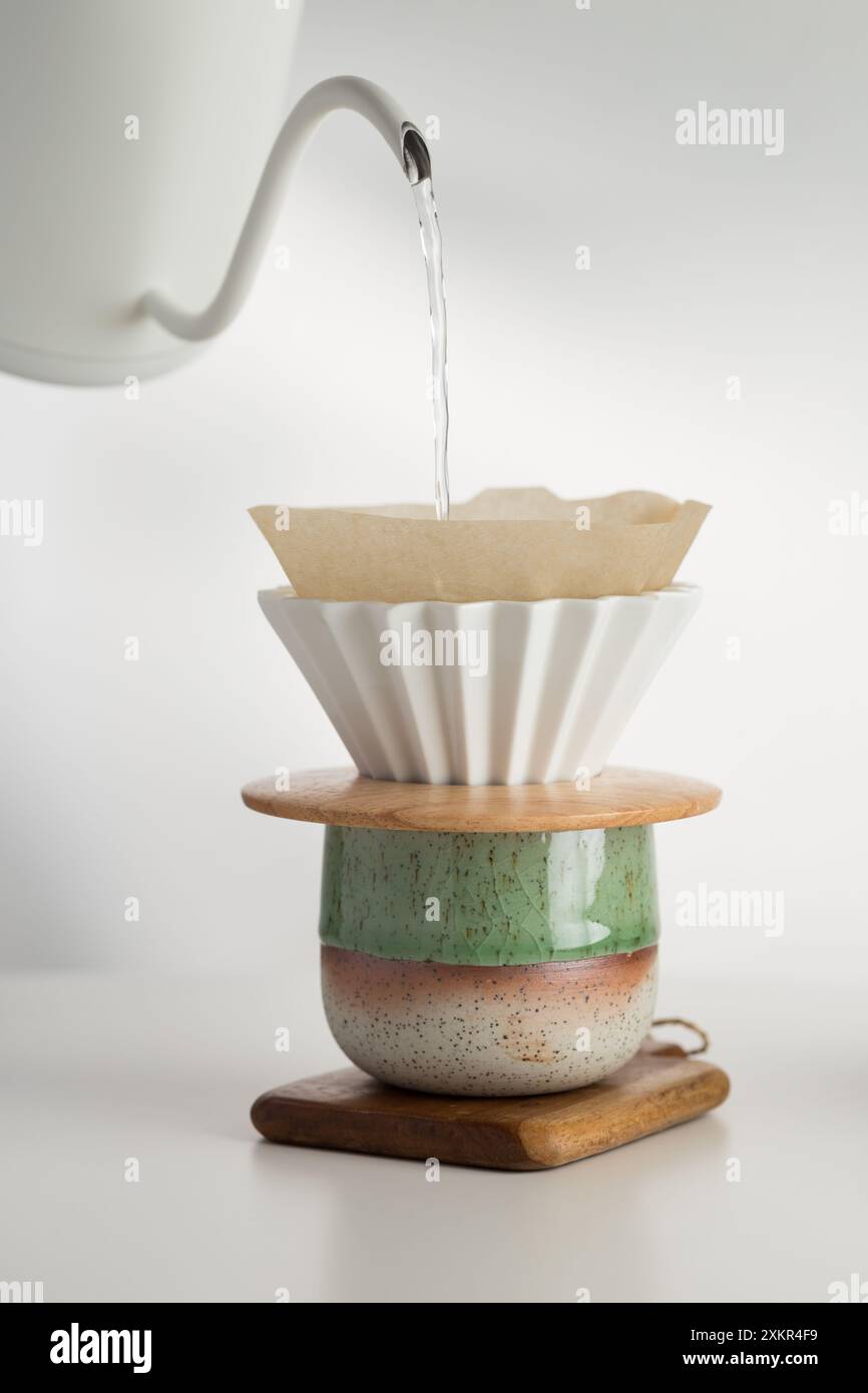 Artful pour-over coffee method captured mid-drip, showcasing the ...