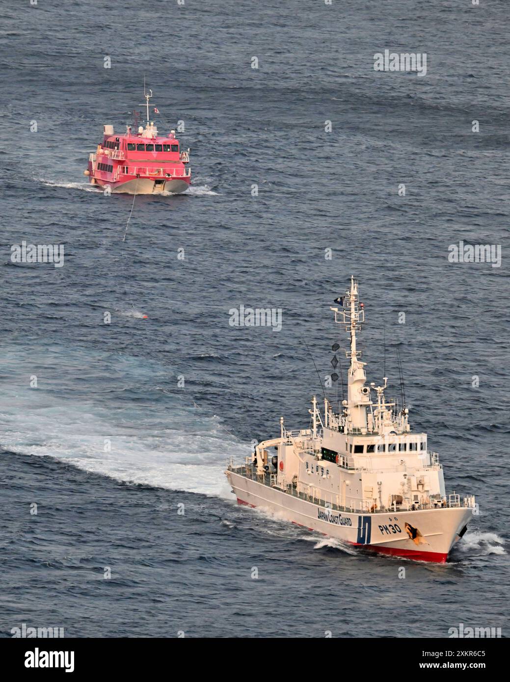 An aerial photo shows Seven Island Ai (top), a hydrofoil ferry being ...