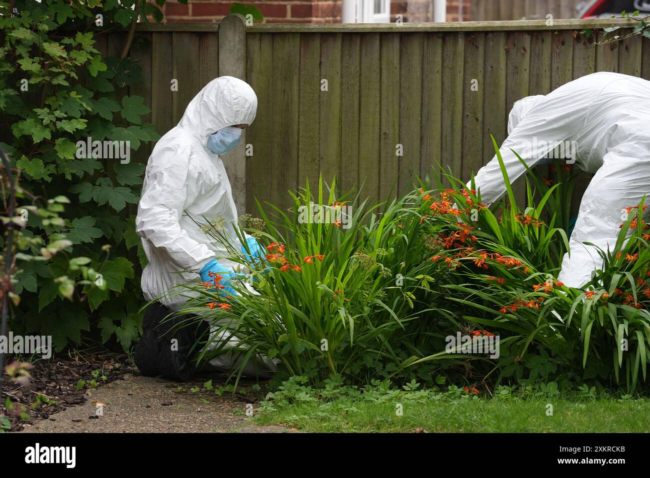 Forensic officers search the scene near Sally Port Gardens in ...