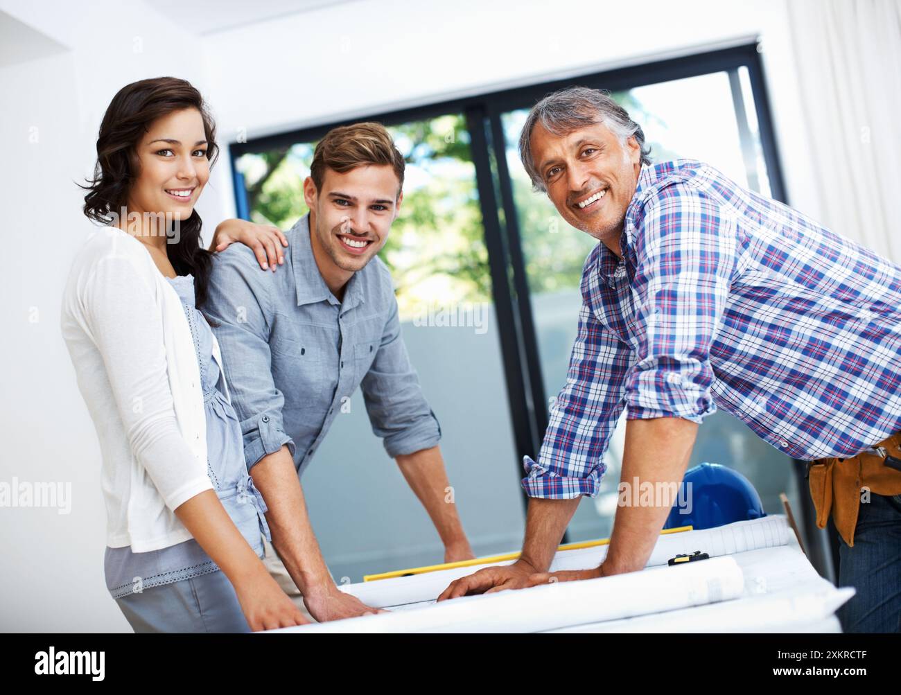 Portrait, handyman or happy couple planning blueprint for construction, sketch or talking for ...