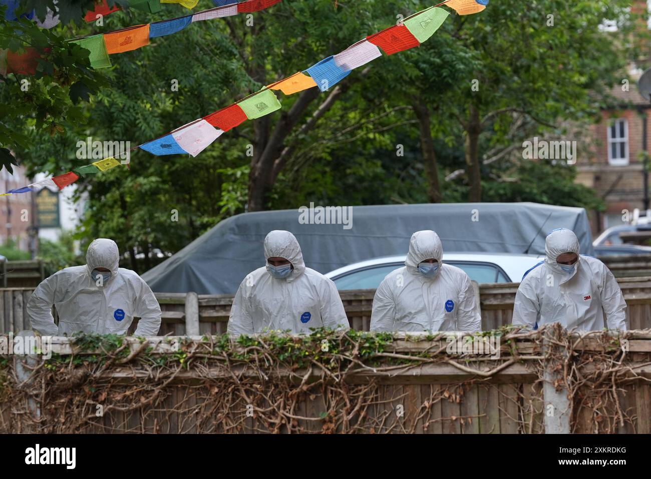 Forensic officers search the scene near Sally Port Gardens in ...