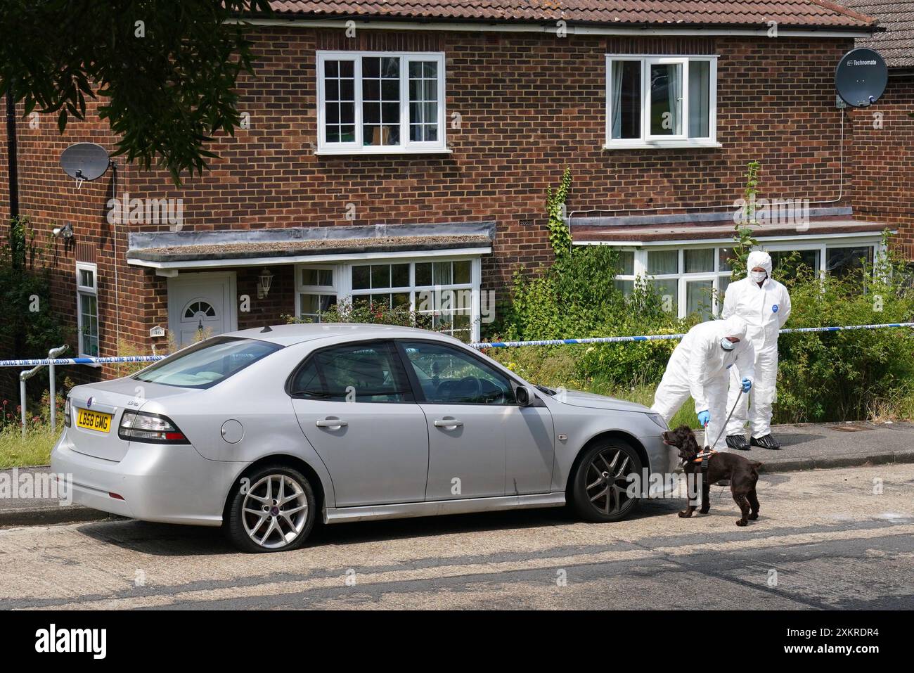 Forensic officers on Mooring Road, Rochester in Kent, where a moped was ...