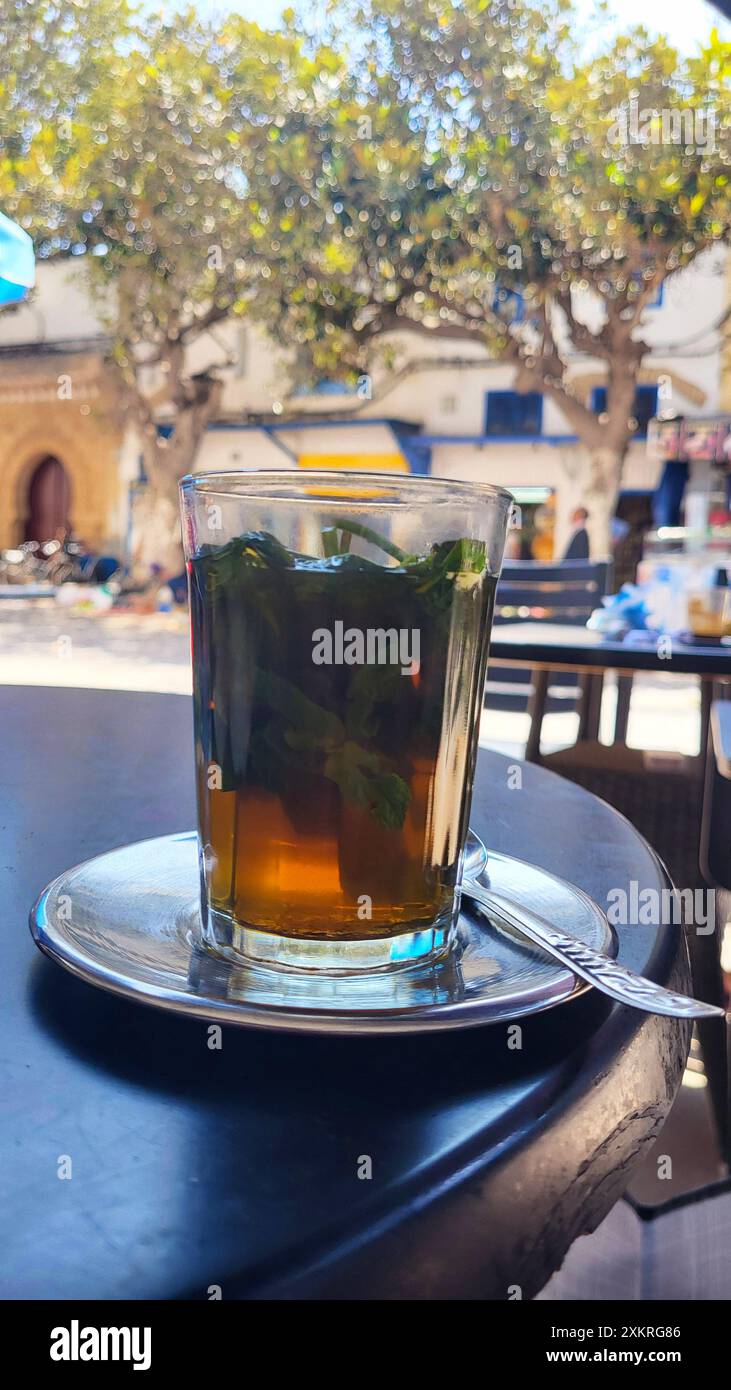 A typical glass of hot mint tea in Morocco Stock Photo - Alamy