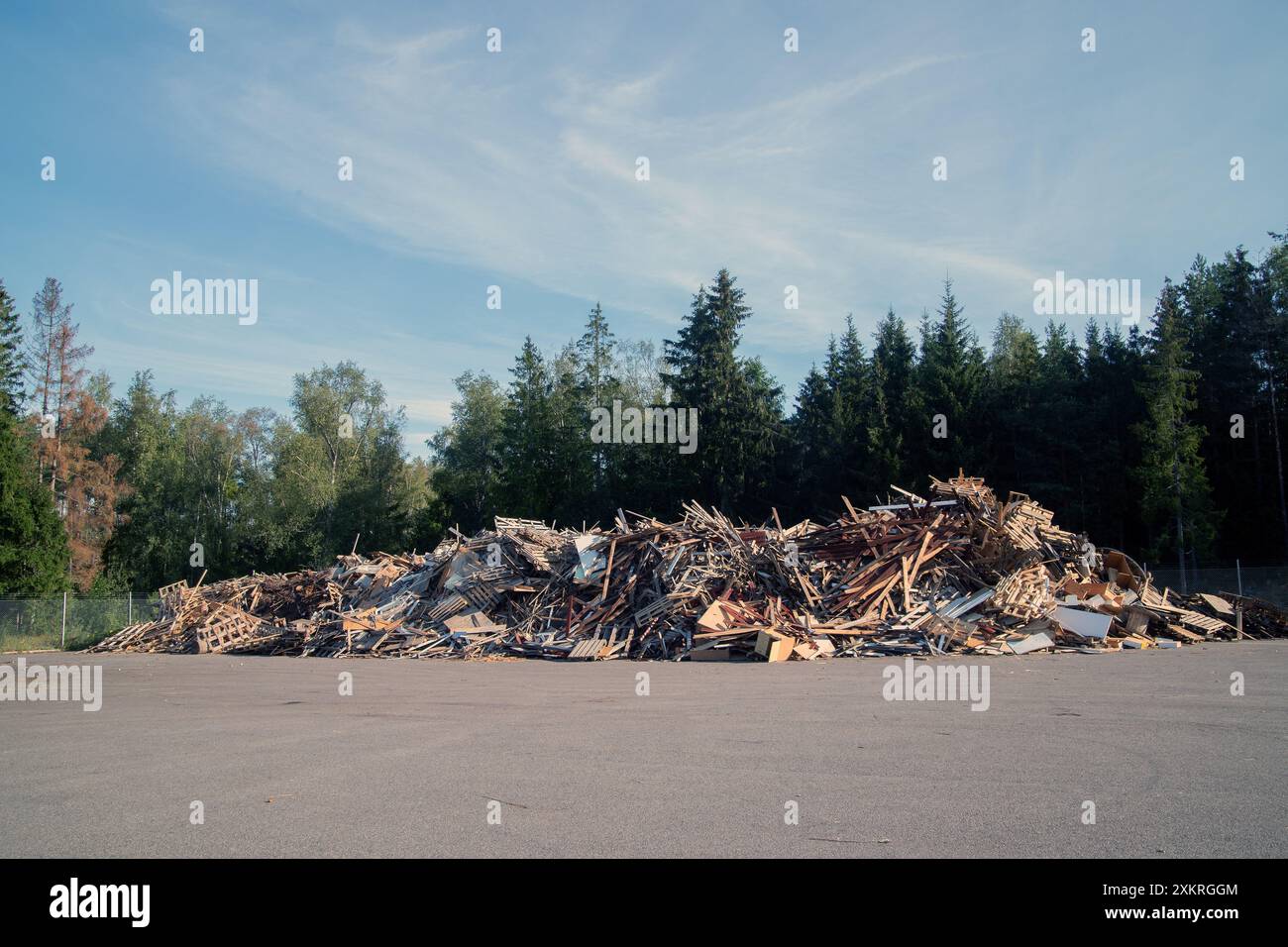 Large pile of demolition timber at recycling station in Sweden Stock ...