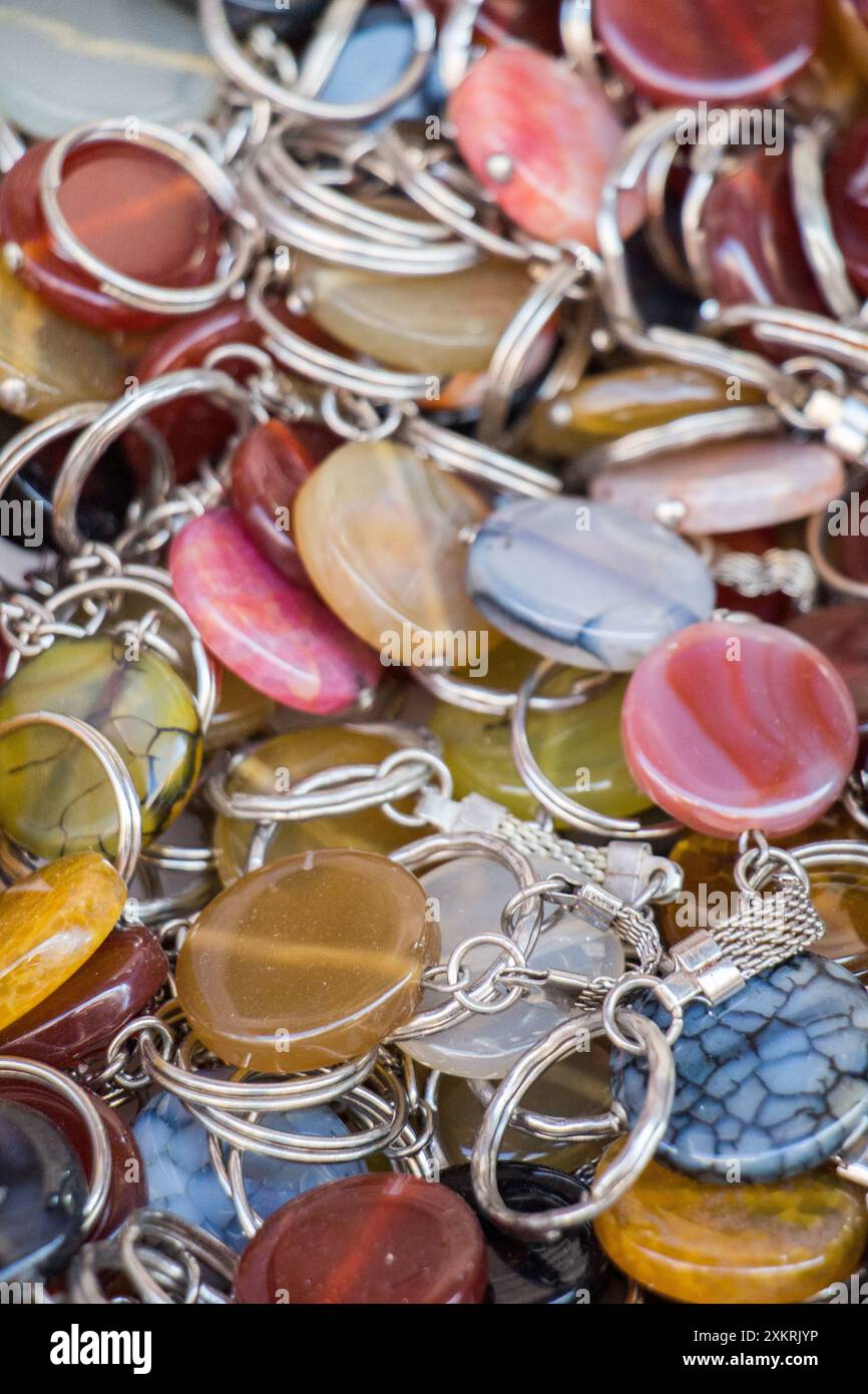 Key holder ring attached to a semi precious stone gem Stock Photo - Alamy