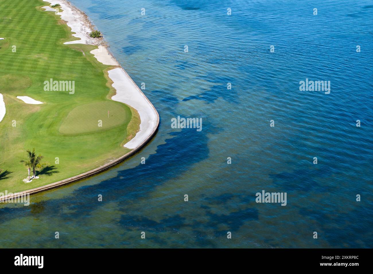 Aerial view of large golf course with green grass in Boca Grande in ...