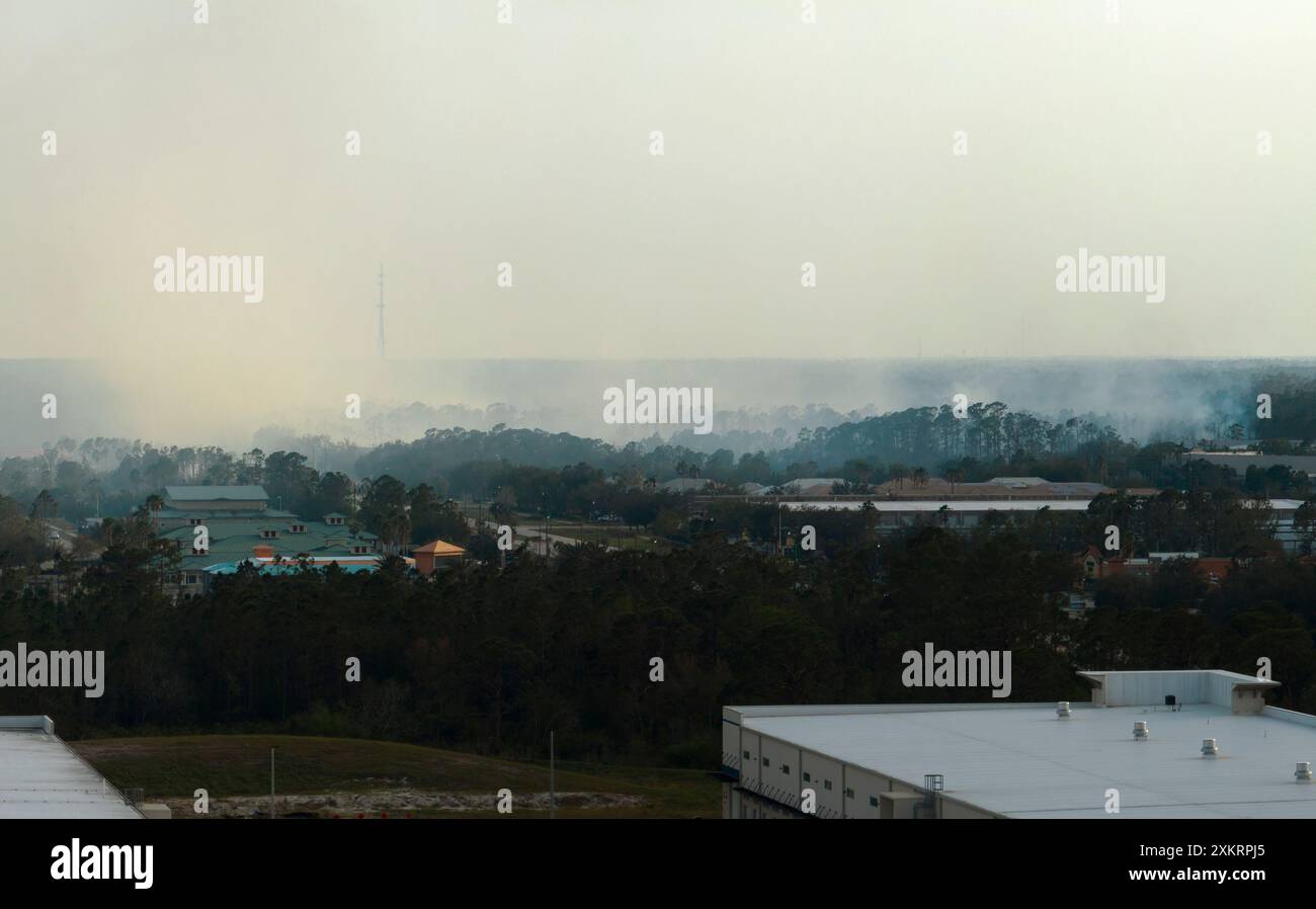 Aerial view of strong wildfire burning severely in North Port city ...