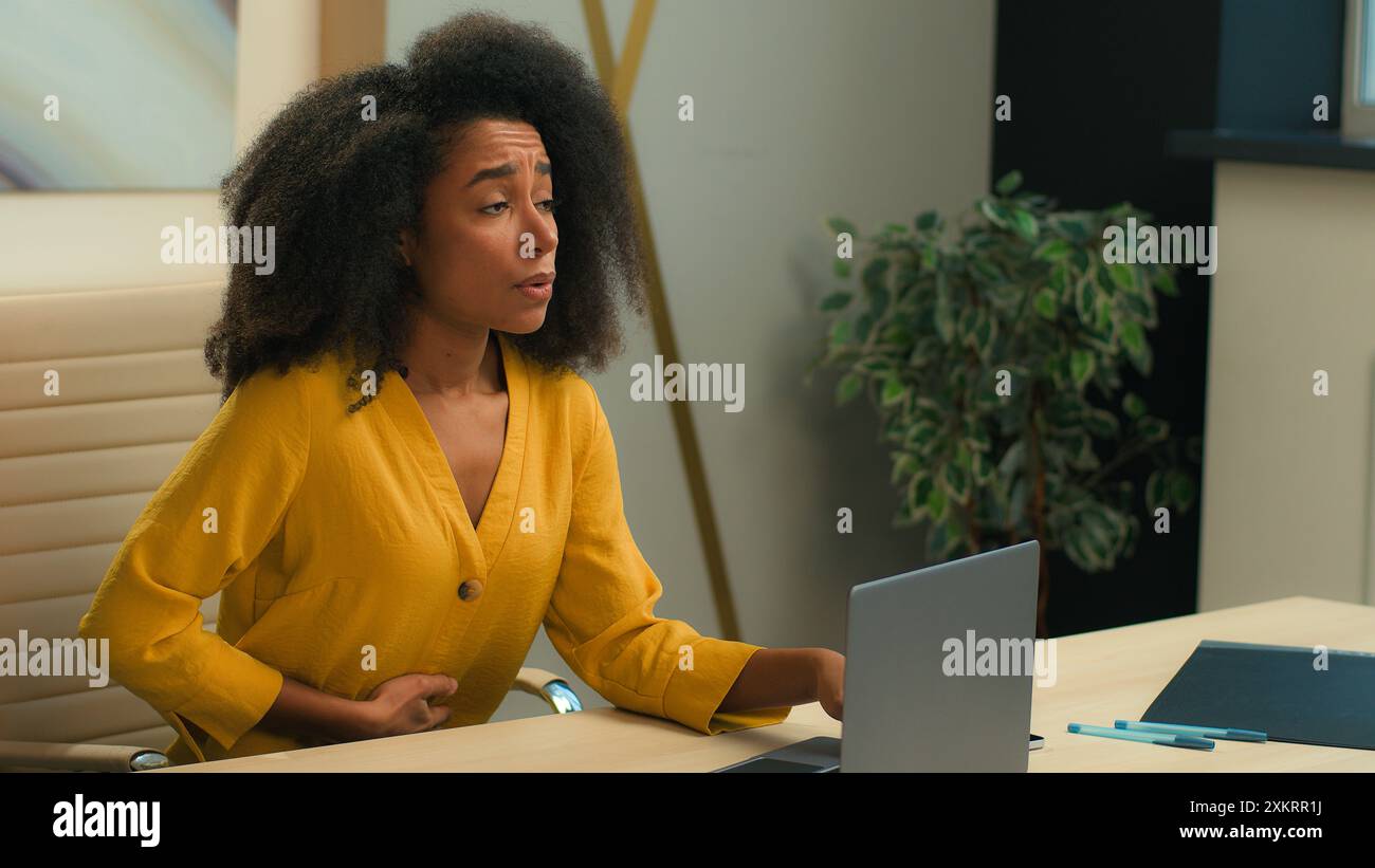 Sick african woman laptop hi-res stock photography and images - Alamy