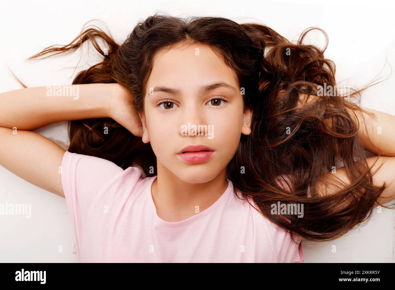 Girl looking back at camera hi-res stock photography and images - Alamy
