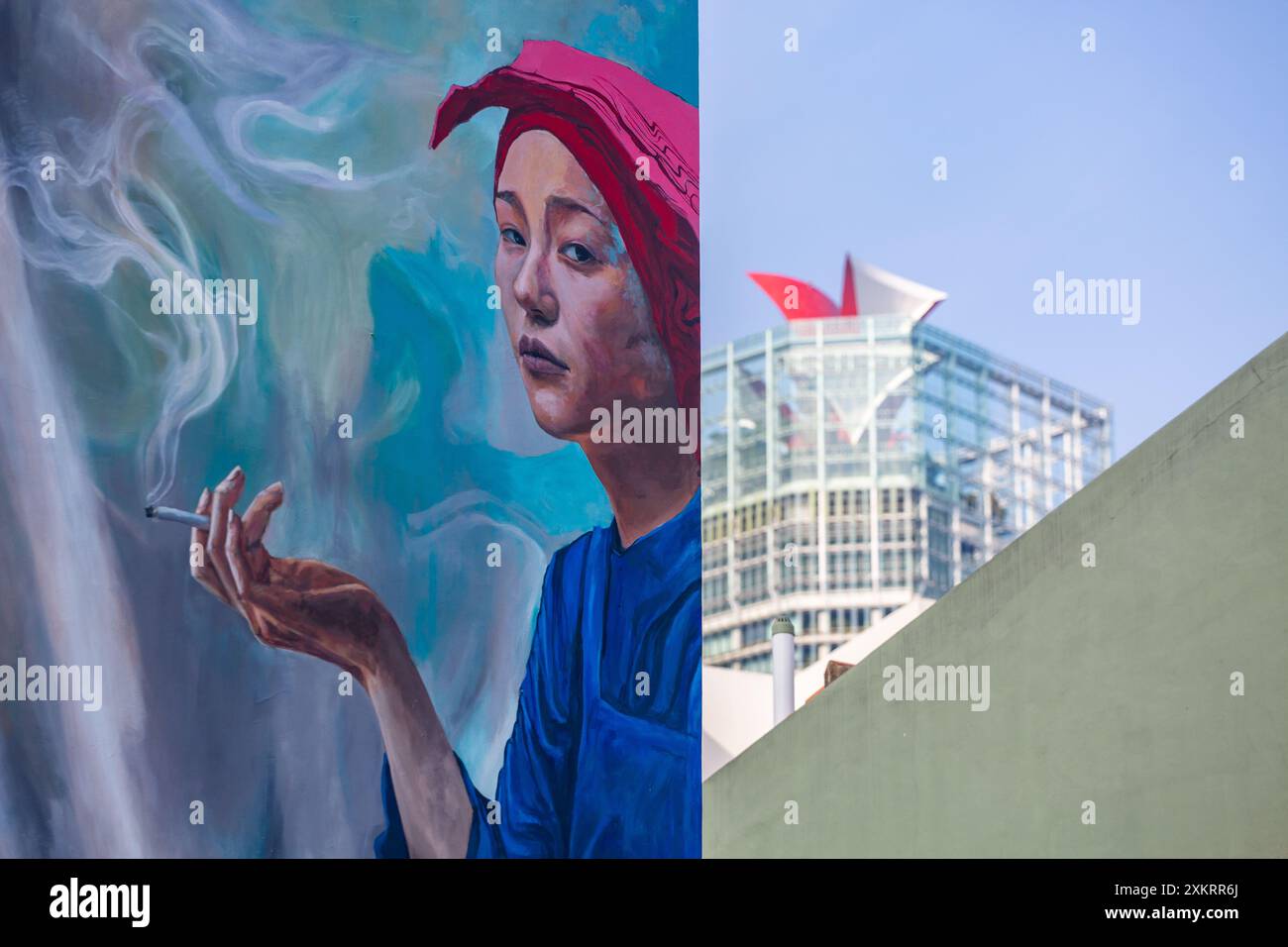 Wall mural of a beautiful Samsui woman holding a cigarette. Emit smoke ...