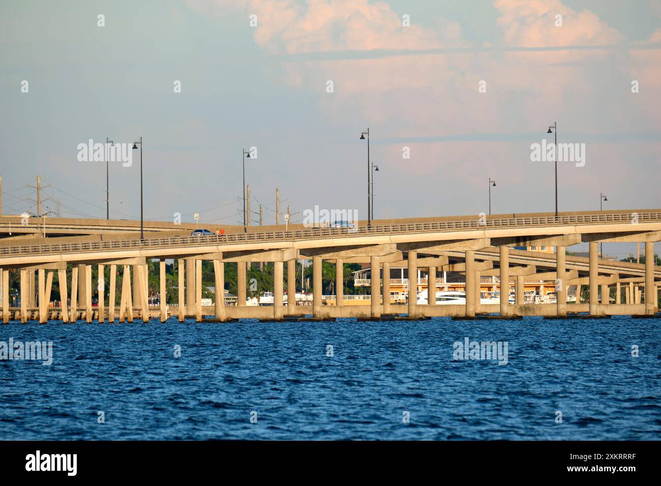 Barron Collier Bridge and Gilchrist Bridge in Florida with moving ...