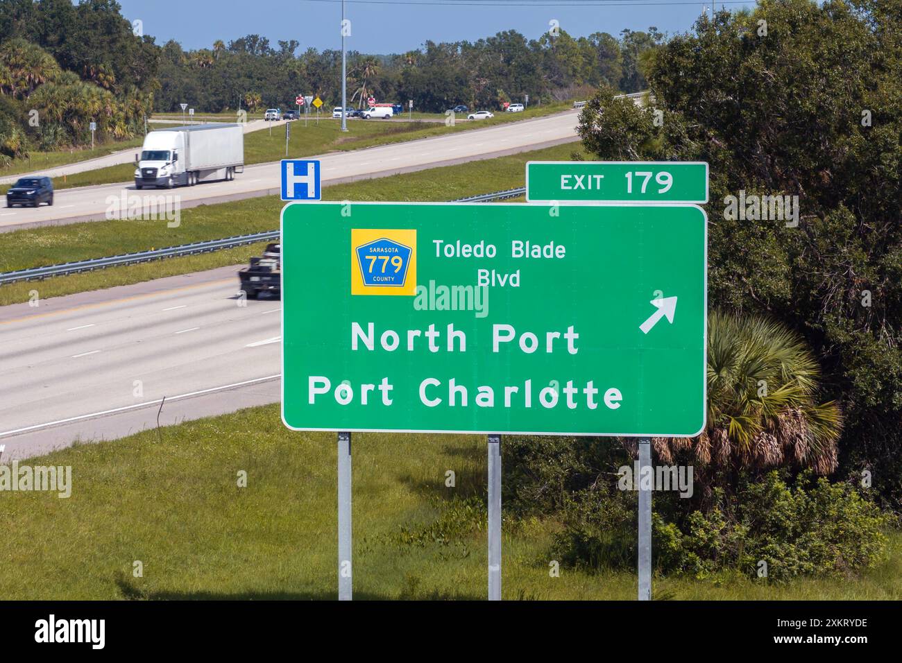 Highway interchange exit sign with direction to North Port and Port ...
