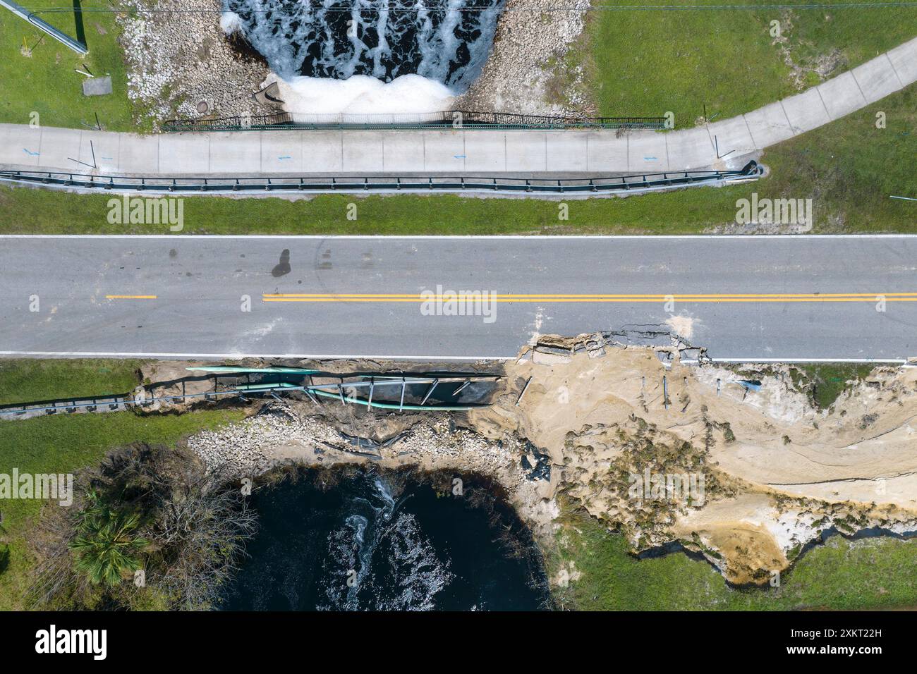 Road construction. Repair of destroyed bridge after hurricane flooding ...