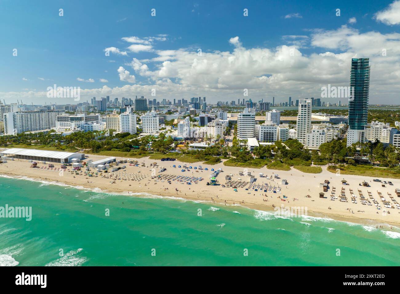 South Beach sandy surface with tourists relaxing on hot Florida sun ...