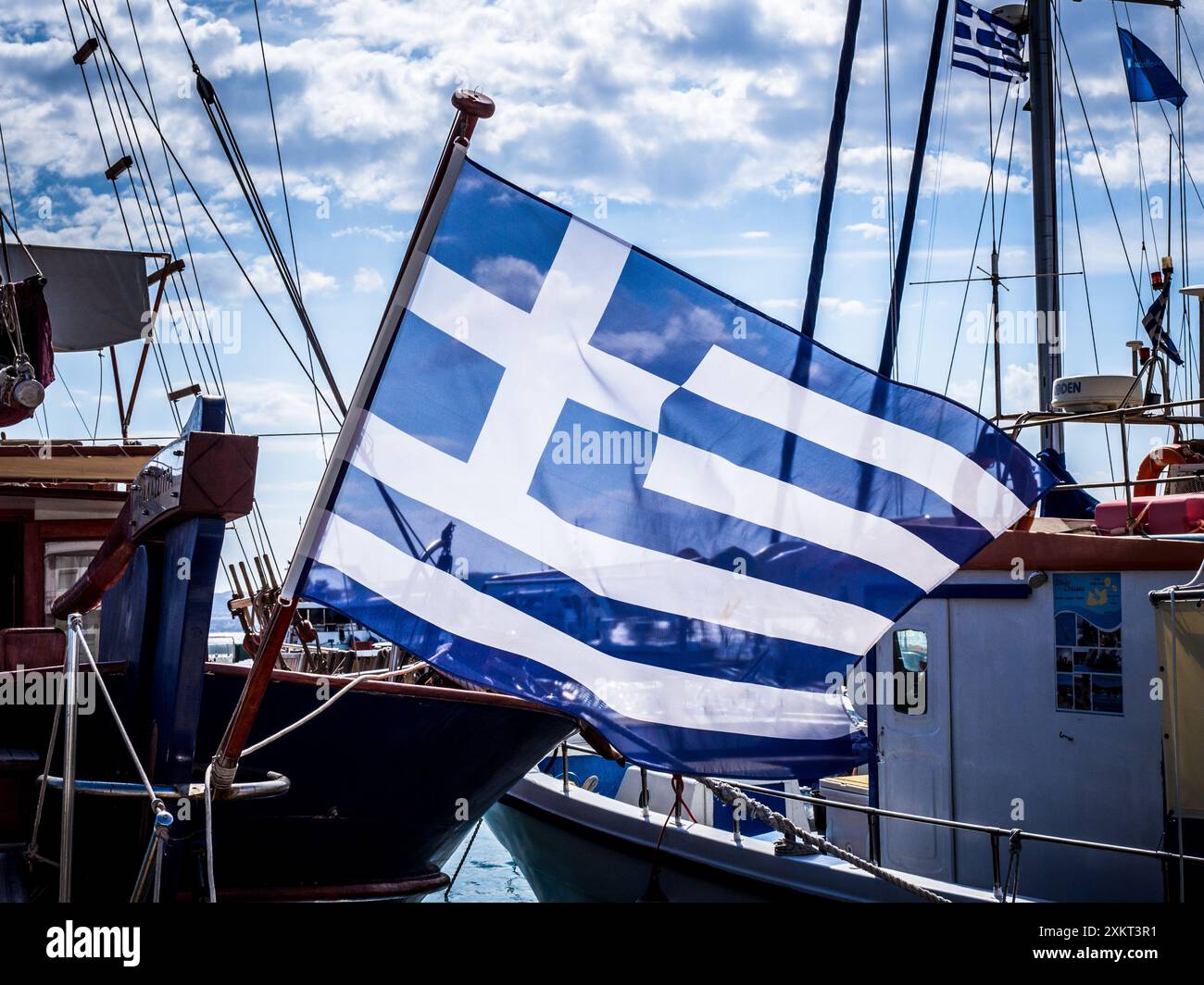 Greece milos greek boat flag hi-res stock photography and images - Alamy