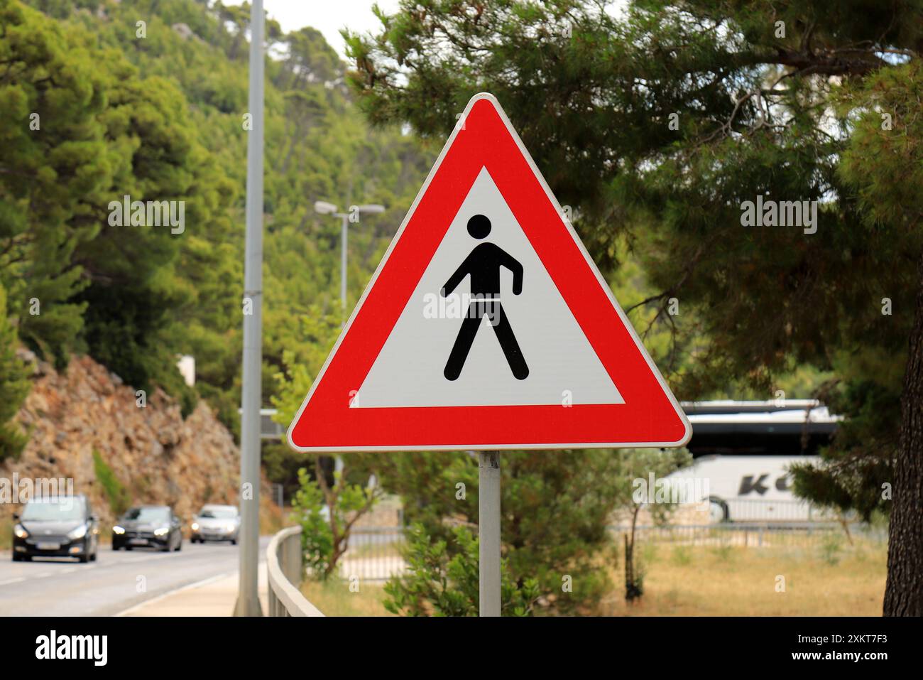 Road sign Pedestrian crossing on a mountain road in Croatia. Triangular ...