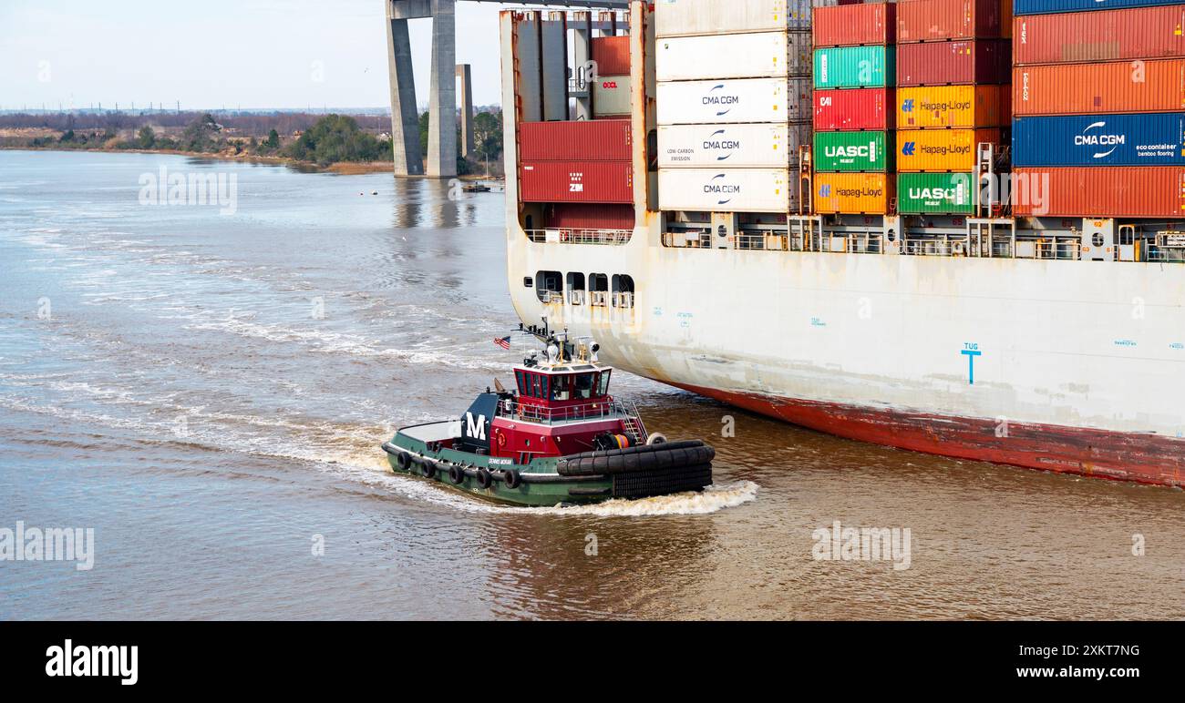Savannha, Georgia, USA - 21 February 2024: A Cargo Ship with containers ...