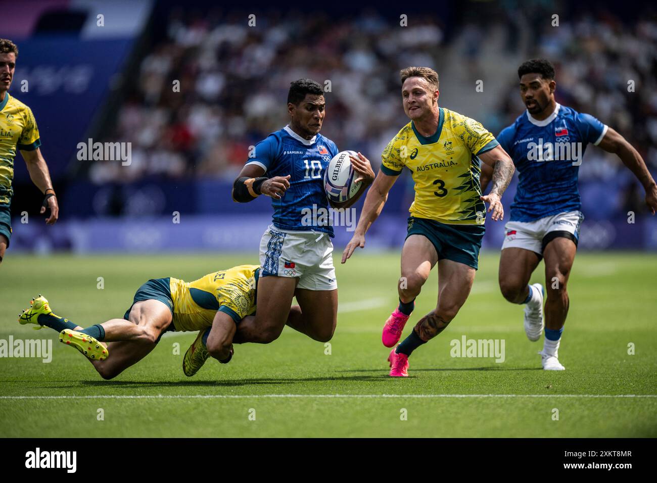 Paris, France. 24th July, 2024. Team Samoa back Paul Scanlan (10), Team ...
