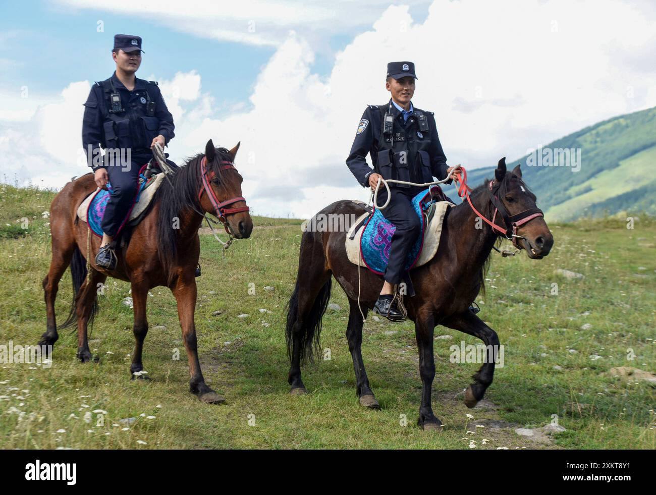 (240724) -- BURQIN, July 24, 2024 (Xinhua) -- Police officers of the ...