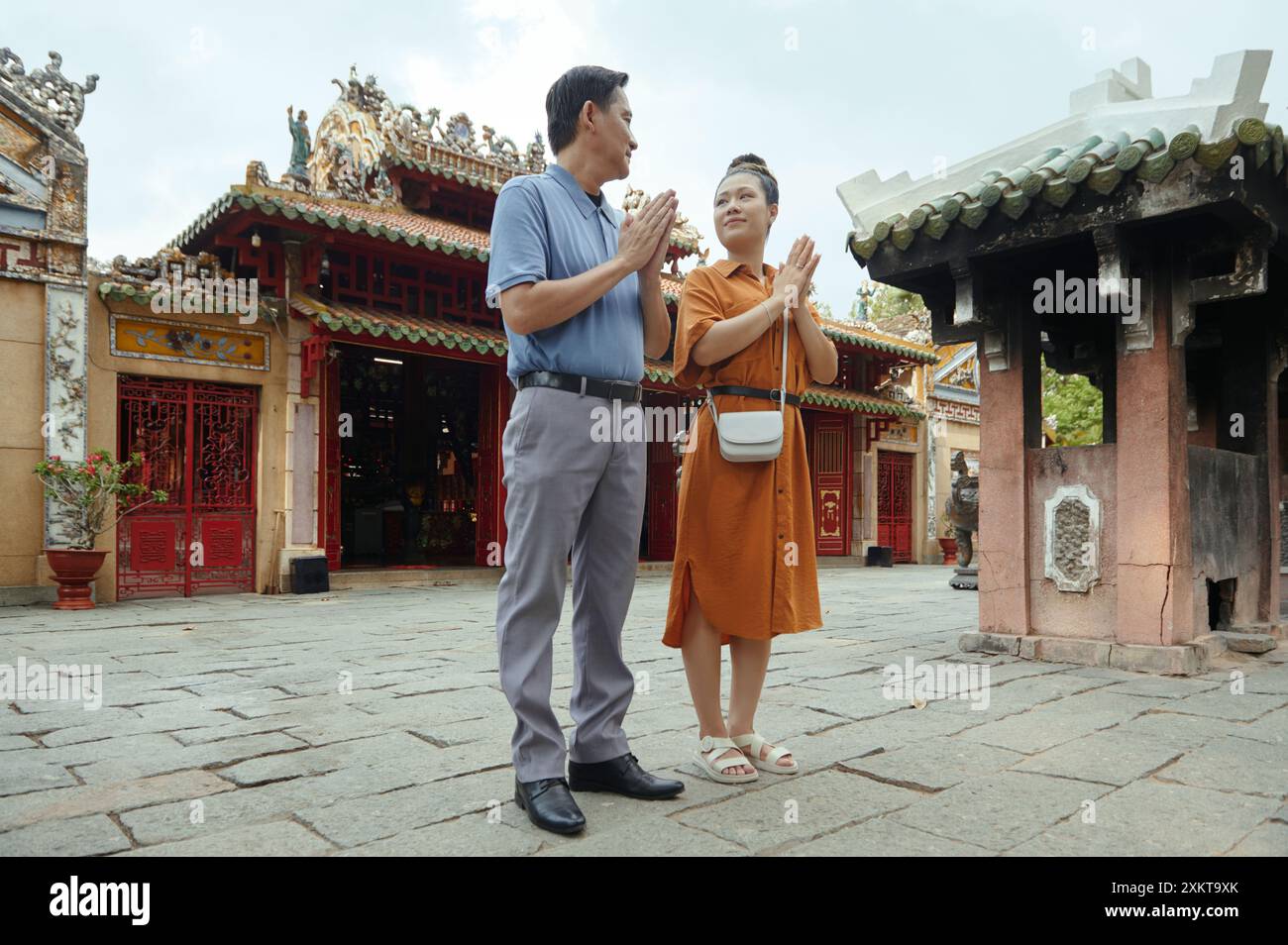 Woman visiting ancient holy temple hi-res stock photography and images ...