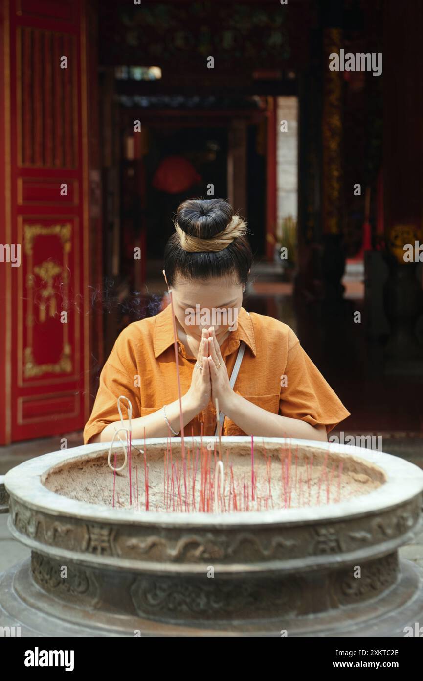 Asian Woman Praying In Old Temple Stock Photo - Alamy