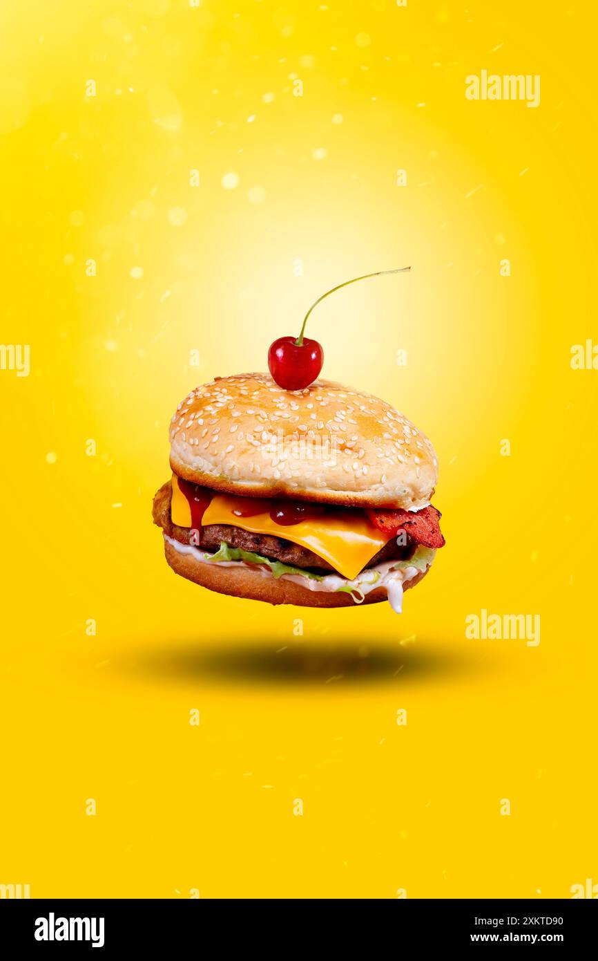 Delicious burger with flying ingredients. Floating cheeseburger set ...