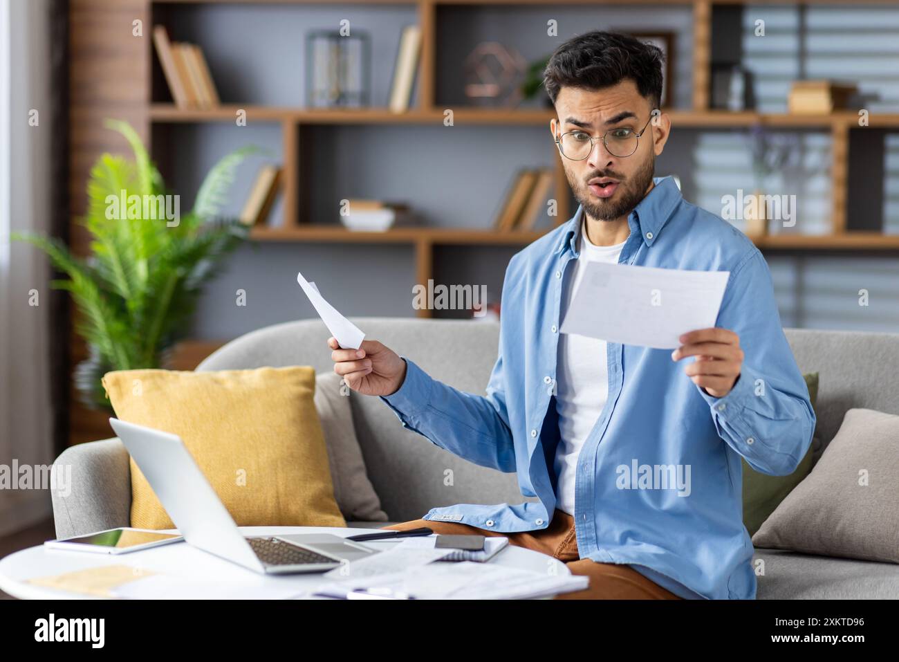 Shocked working young man reacting hi-res stock photography and images ...
