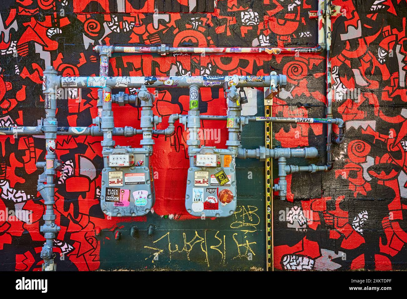 Urban Graffiti Wall with Industrial Piping and Meters at Eye Level ...