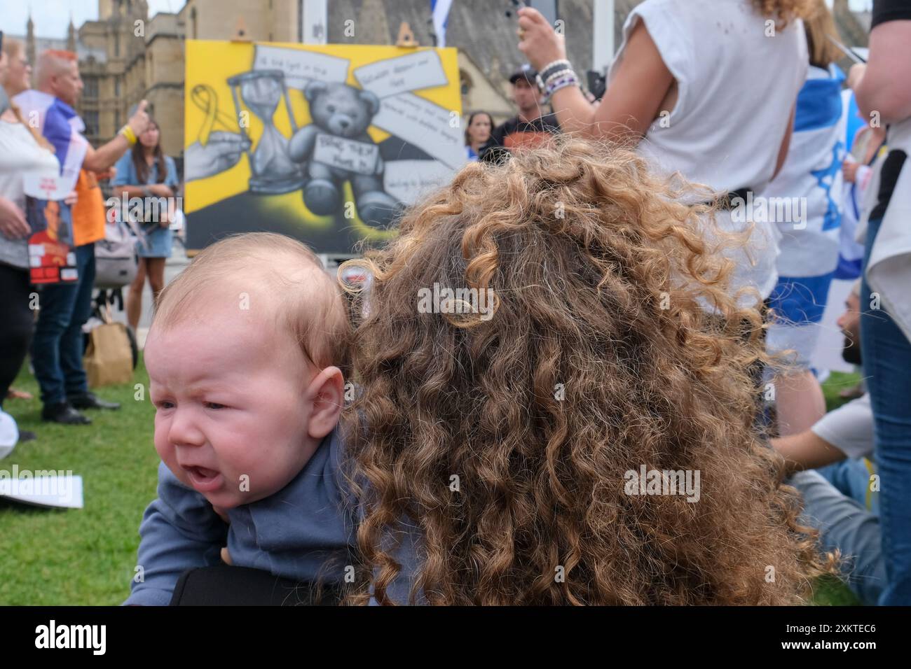 London, UK, 24th July, 2024. Ella, widow of Tal Haimi and baby Lotan ...