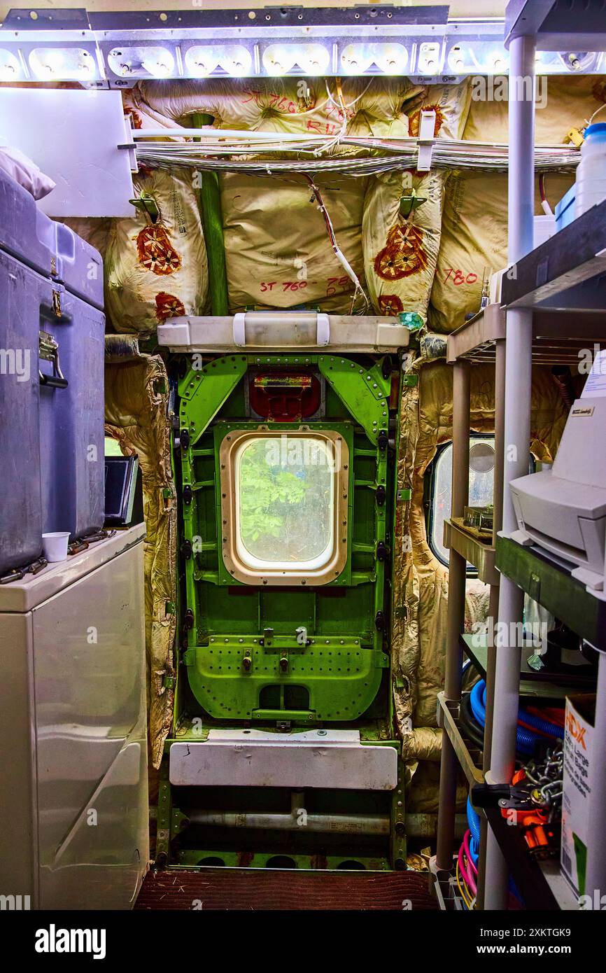 Aircraft Maintenance Area with Green Door and Tools at Eye-Level ...
