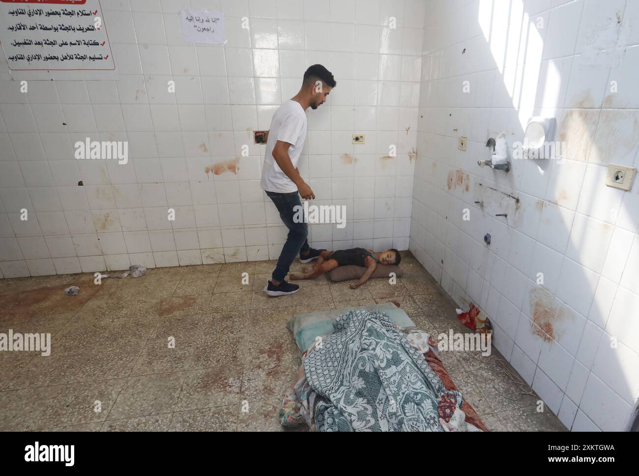Relatives of the Palestinians child who died in Israeli attacks, mourn ...