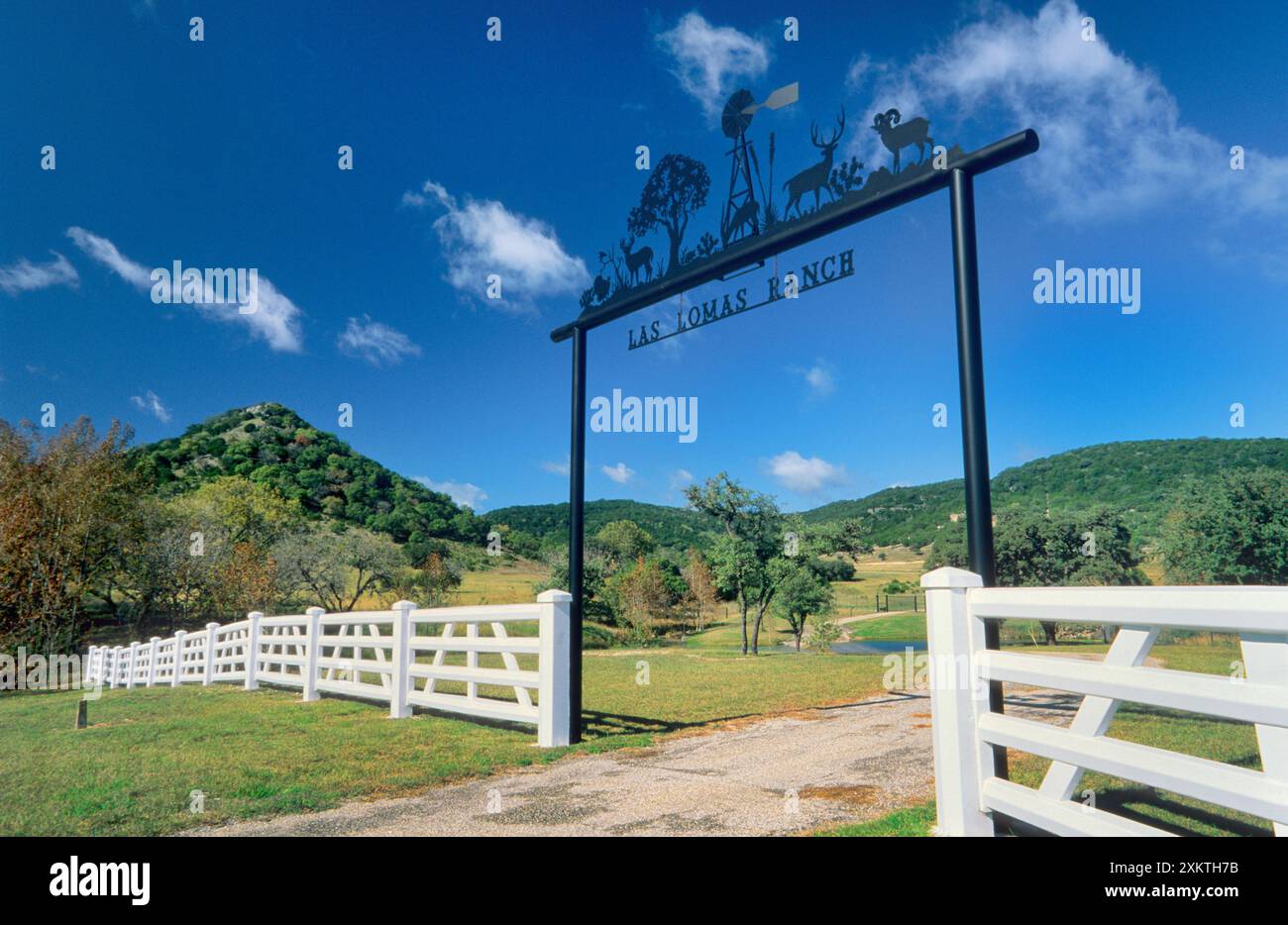 Wrought iron sign on gate on FM 337 highway near Vanderpool in Bandera ...