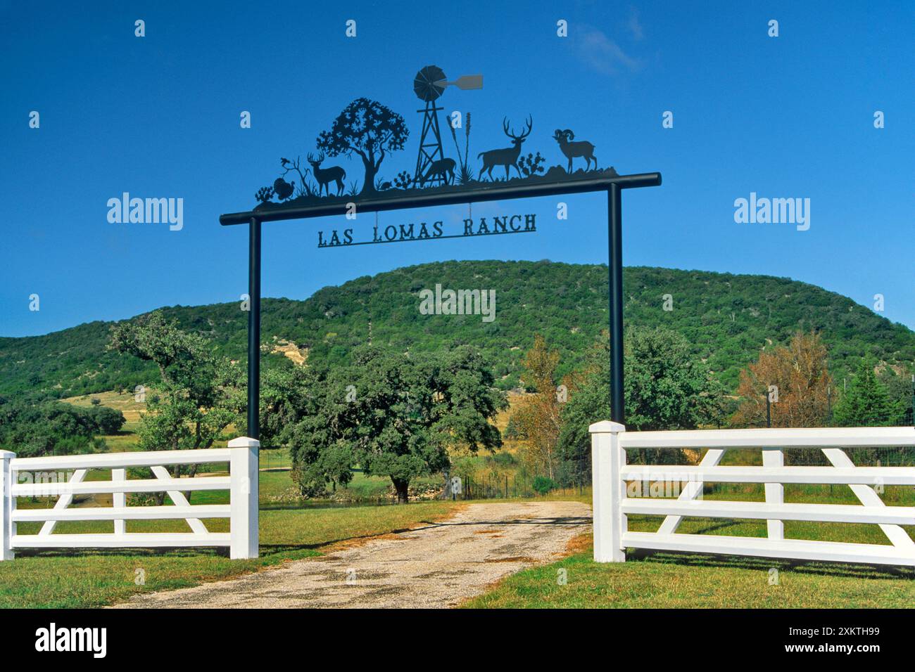 Wrought iron sign on gate on FM 337 highway near Vanderpool in Bandera ...