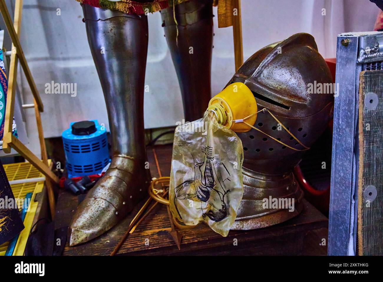 Medieval Armor and Modern Gear in Eclectic Storage Room Stock Photo - Alamy