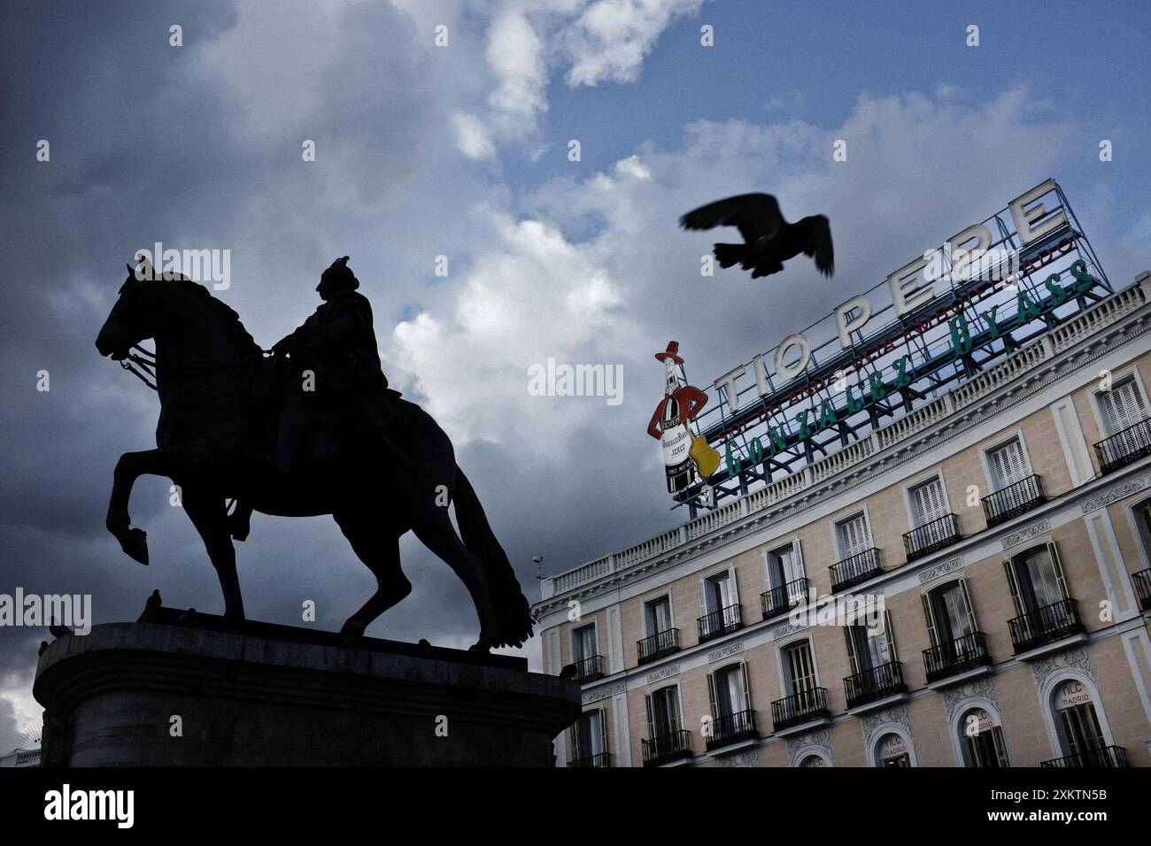 The Puerta del Sol, in Madrid, with the statue of Carlos III in the ...