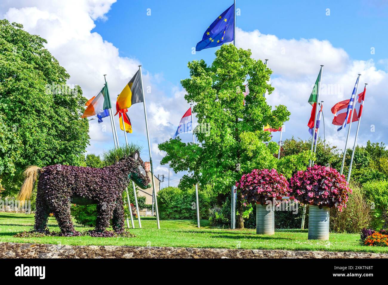 Life-size donkey or horse situated on traffic roundabout and made from ...