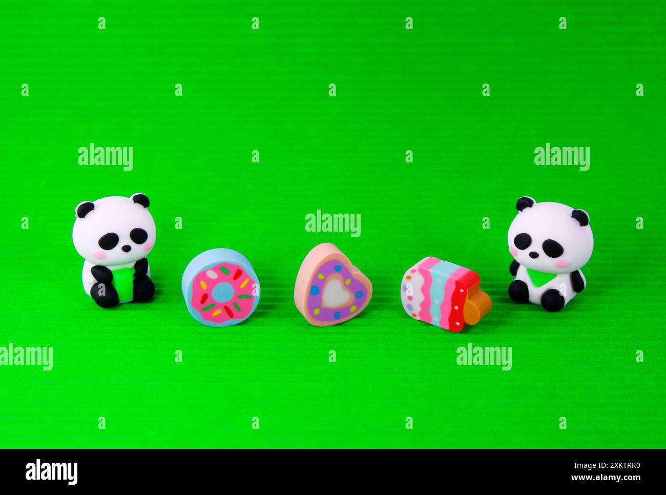 Panda bears enjoying various sweets Stock Photo - Alamy