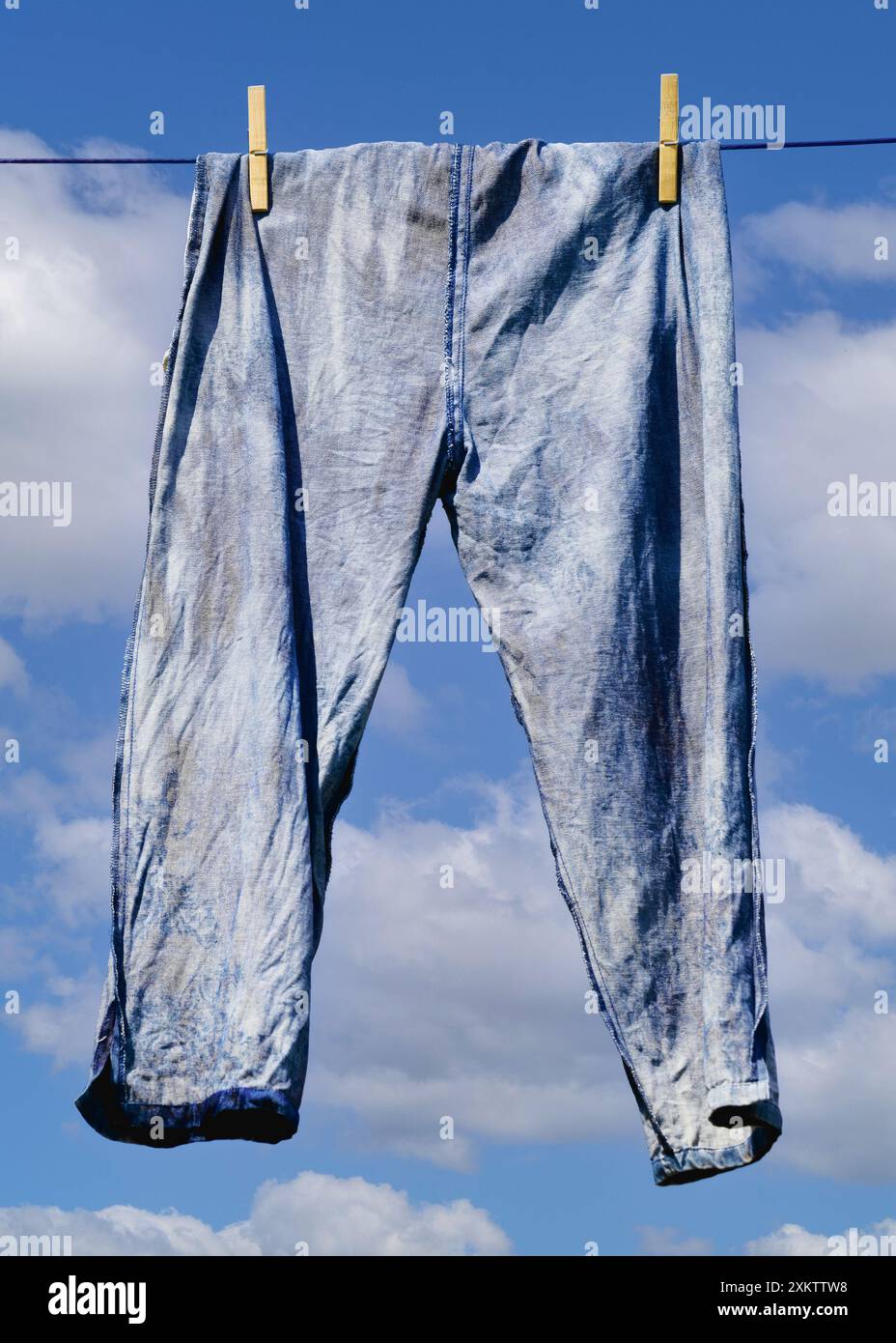 Blue jeans drying hi-res stock photography and images - Alamy