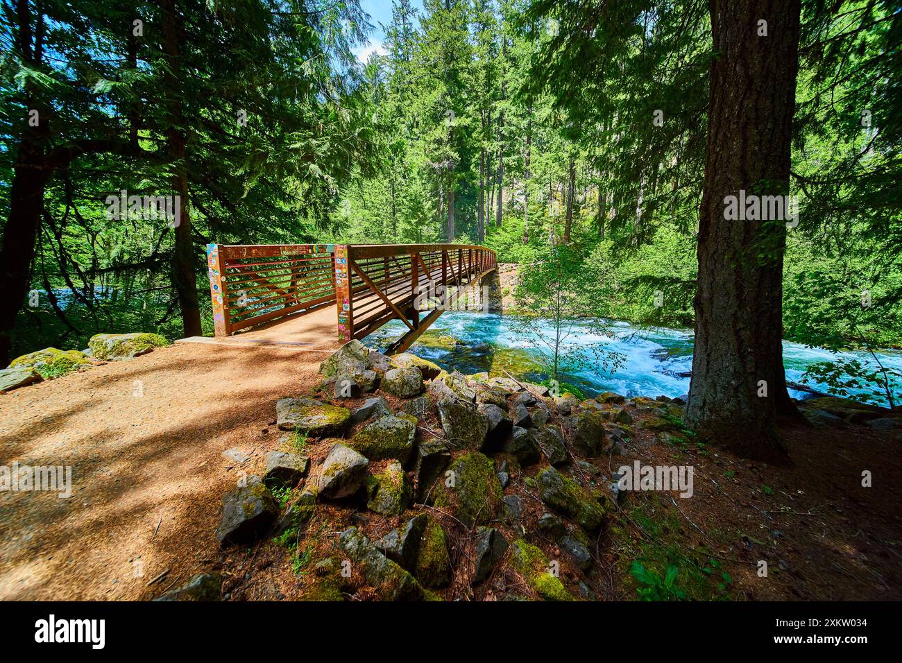 Wooden Bridge Over River in Lush Forest Path Perspective Stock Photo ...