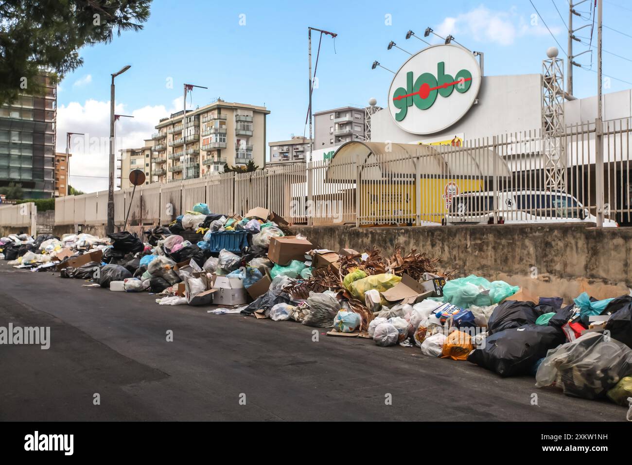 Dumpsters overflowing with waste in Palermo, Italy Stock Photo - Alamy