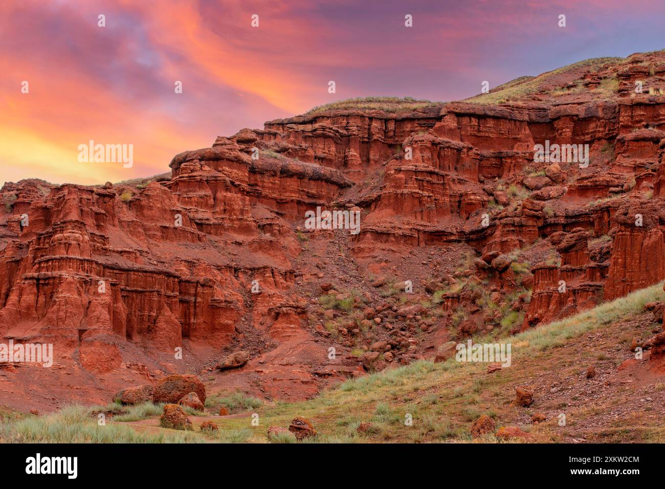 Red fairy chimneys shaped like formations that are millions of years ...