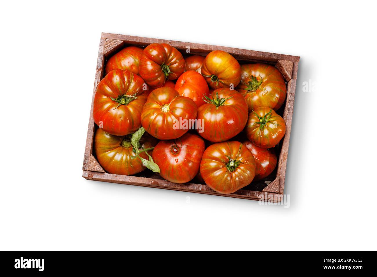 Assorted tomatoes in rustic crate. Flat lay. Isolated on white ...