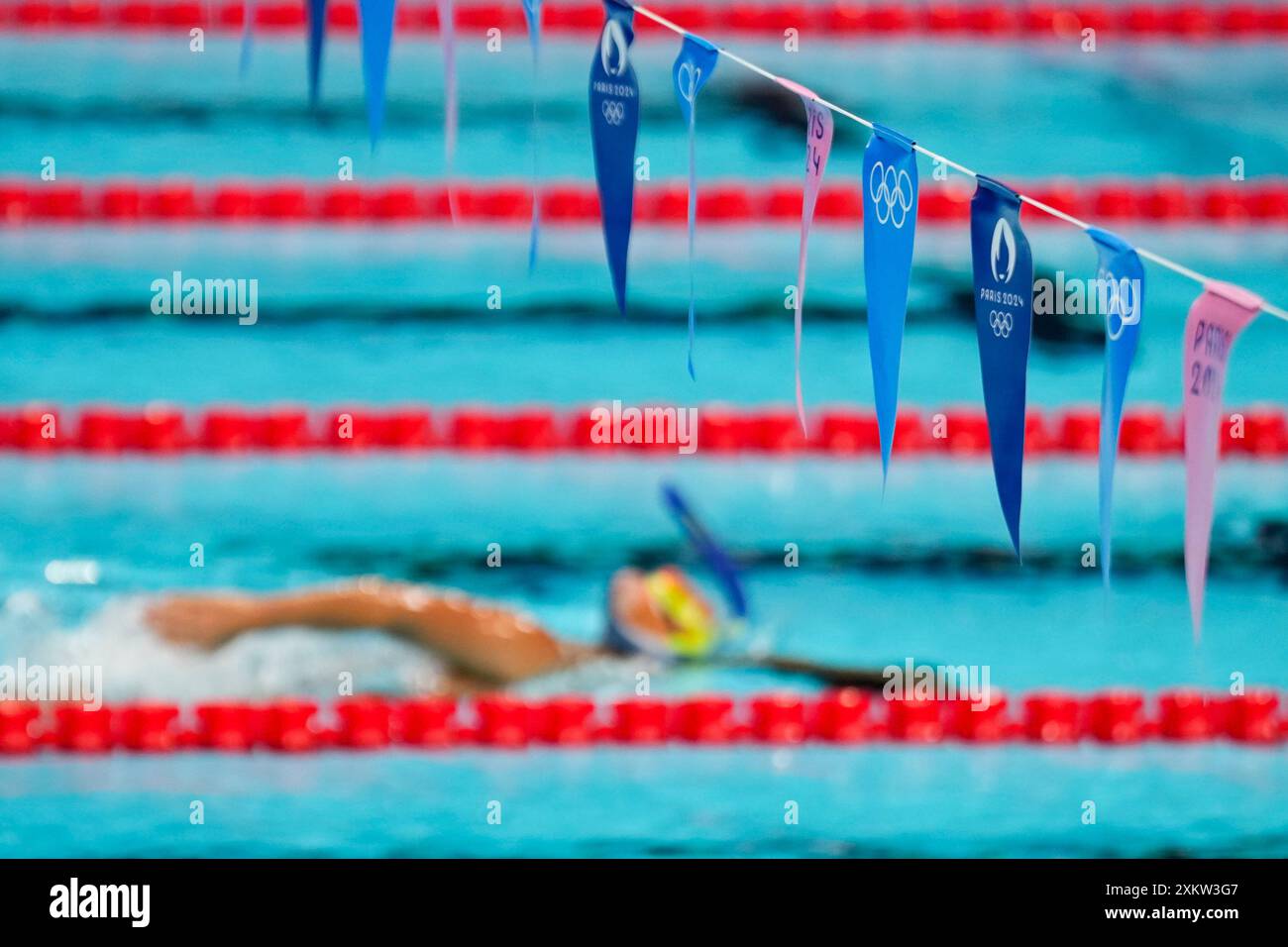 A swimmer trains at La Defense Arena ahead of the 2024 Summer Olympics ...