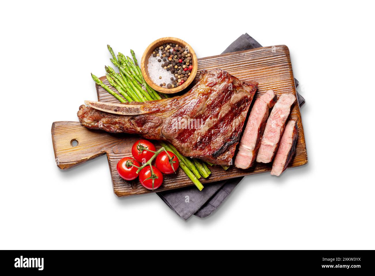 Medium rare grilled Tomahawk beef steak with asparagus. Flat lay ...