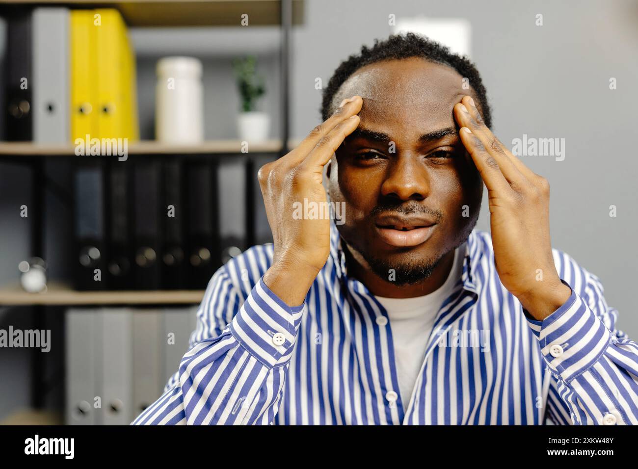 Tired busy man suffering hi-res stock photography and images - Alamy